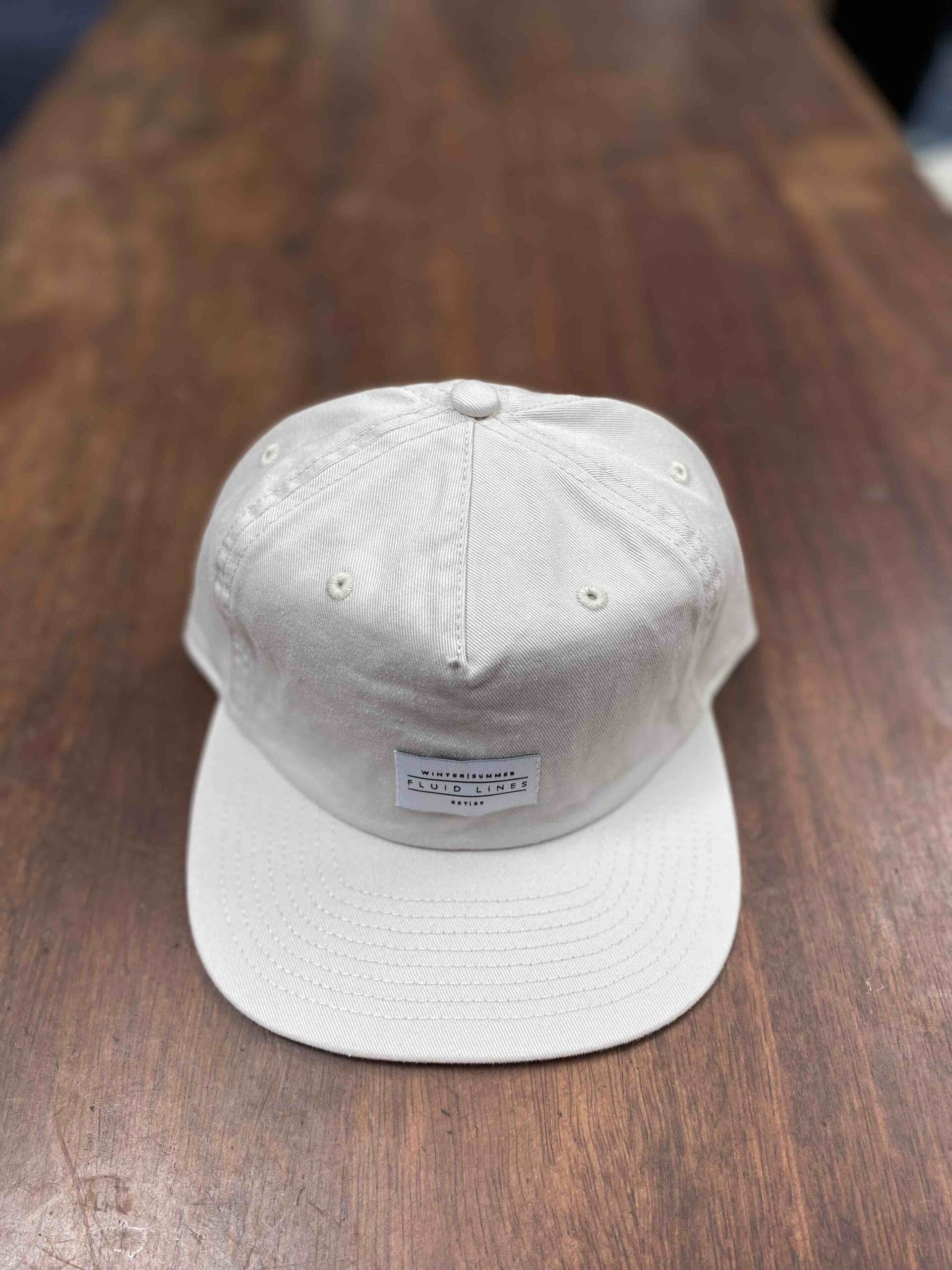 Fluid Lines Cap - White - Fluid Lines, Essex